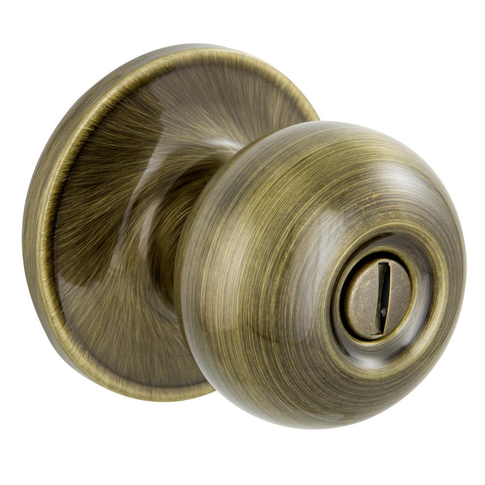 Essentials By Schlage Jeffir Antique Brass Privacy Bedbath Door Knob V40 V Jff 609 The Home Depot